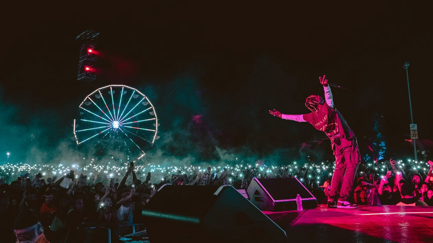 Watch: Travis Scott Performs With Fan During First Concert Since ...
